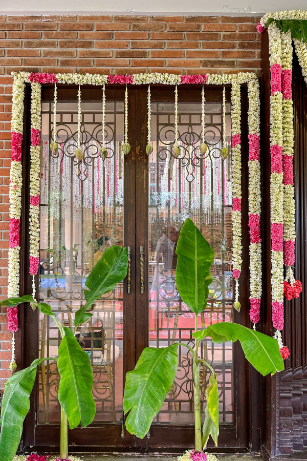 Muhurtham White Pink Fresh Flower Decoration | Banana Plants | Kolam ...